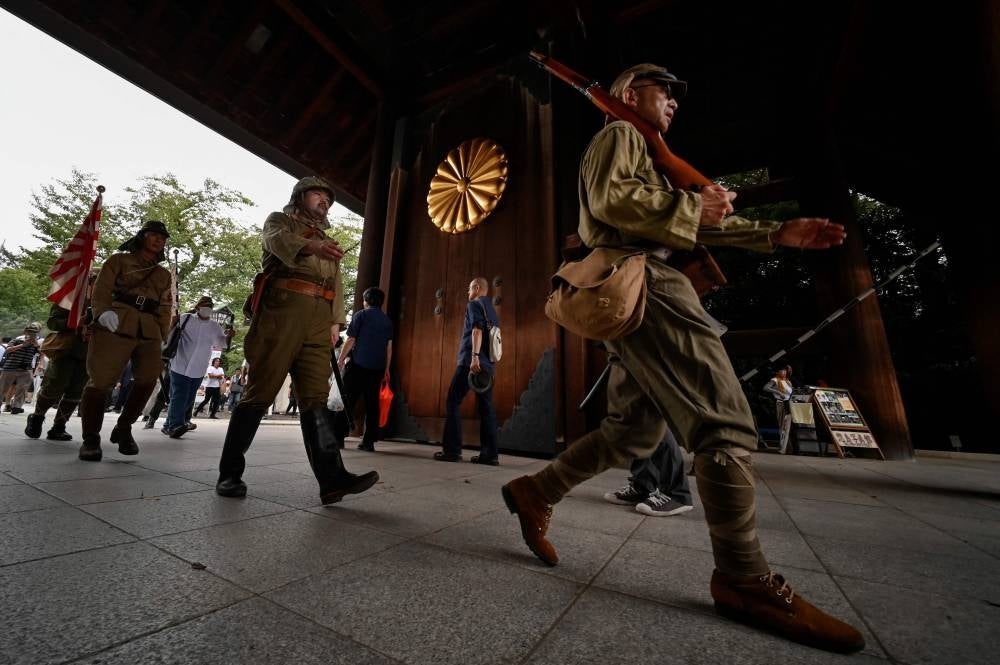 Japanese PM sends offering to notorious war-linked Yasukuni Shrine ...