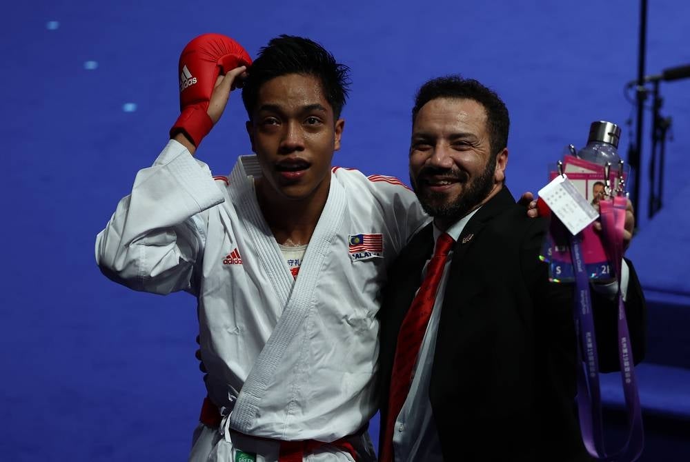 Karate exponent Muhammad Arif delivers gold number six for Malaysia ...