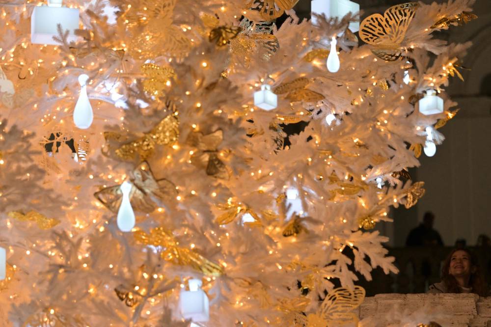 Woman dies after Christmas tree falls on her in Belgian market - Sinar ...