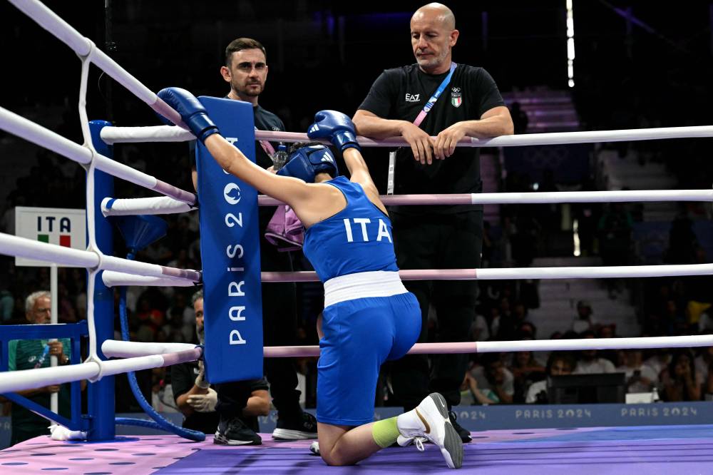 Algeria boxer Imane Khelif in Olympic gender row wins in 46 seconds as ...