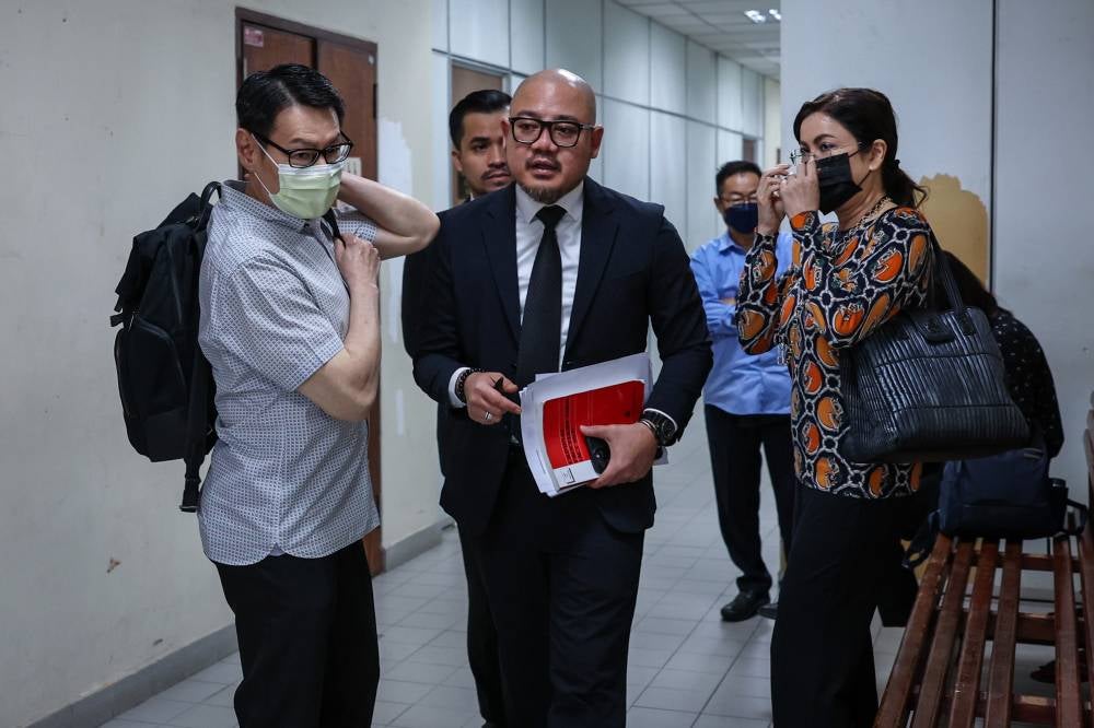 Unregistered investment scheme: Married couple claims trial - Sinar Daily