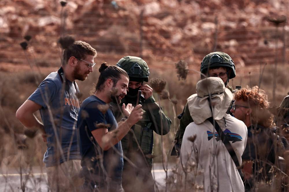 Dozens of MPs call on UK government to halt all military exports to ...