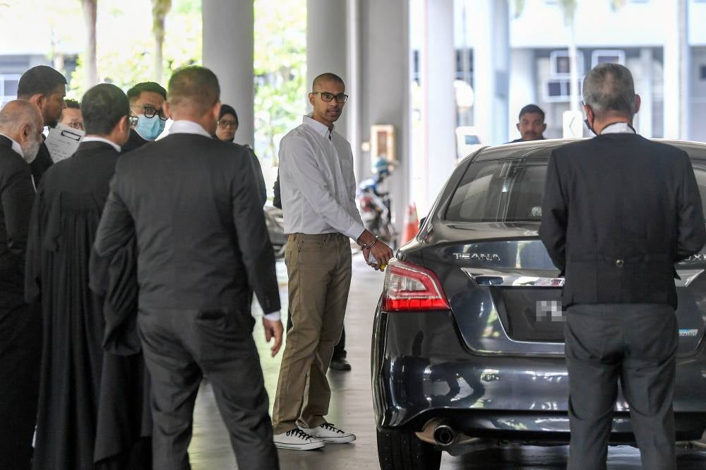 Yusoff Rawther unable to open driver's side door during raid, says ...