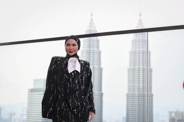 Performing Asean 2025 theme song a career highlight for Aina Abdul ...