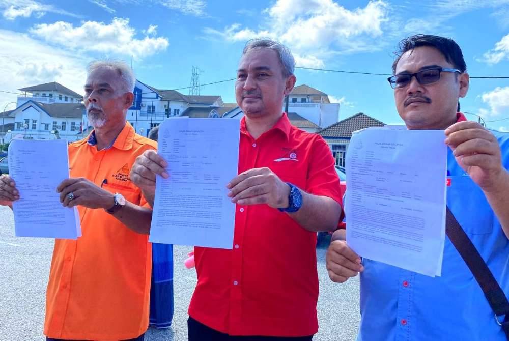 [VIDEO] BN-PH Machang buat laporan polis ke atas Wan Ahmad Fayhsal ...